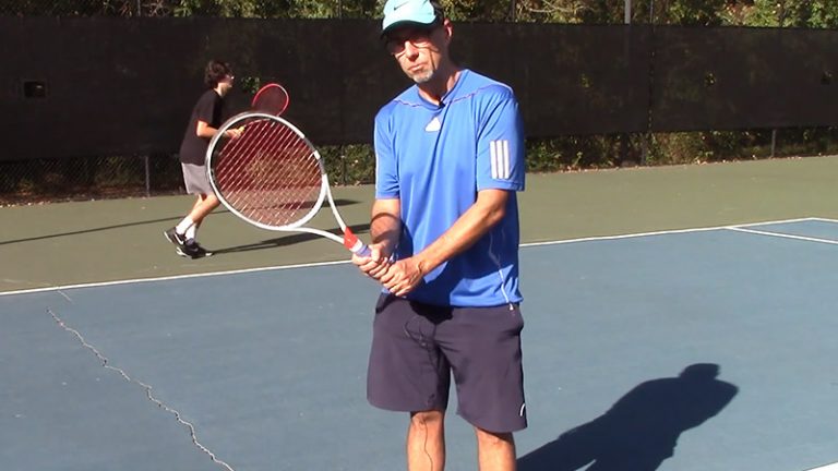 Do You Hold A Tennis Racket With Two Hands? - Metro League