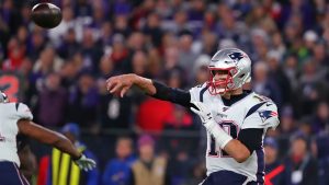 Why Do Quarterbacks Tap Their Helmets? - Metro League